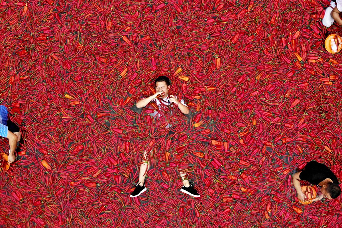 China's Chili-Eating Competition Is a Hot Slobbering Mess - Saigoneer