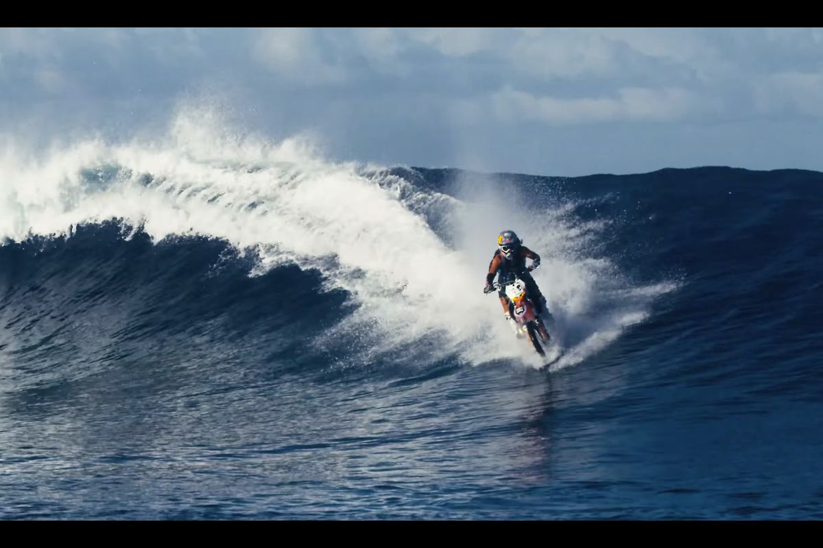 [Video] Dirtbiker Glides On Water, Surfs Waves With Custom Bike - Saigoneer