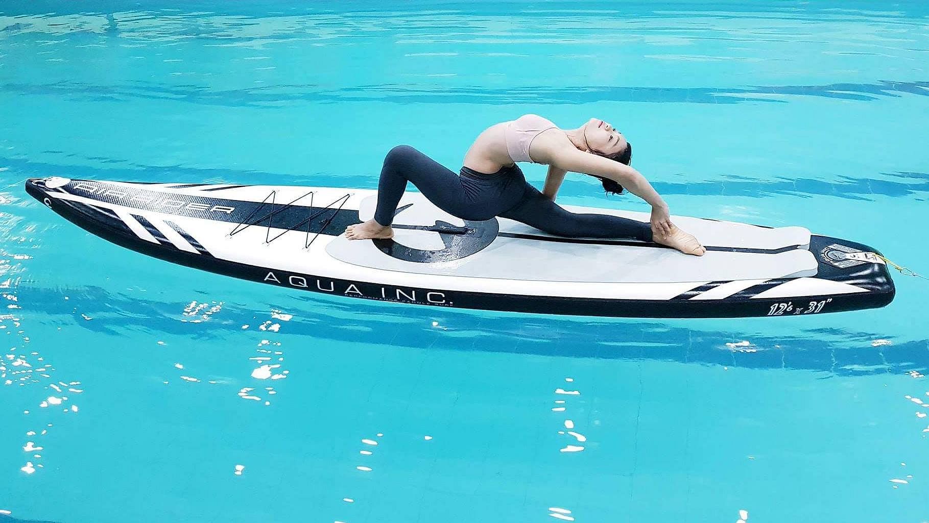 District 2 SUP yoga - swimming pool @ W.A.O SUP Saigon - Saigoneer